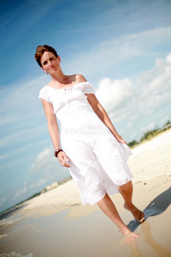 Pretty Woman Walking the Beach Stock Image - Image of beautiful, glamor ...