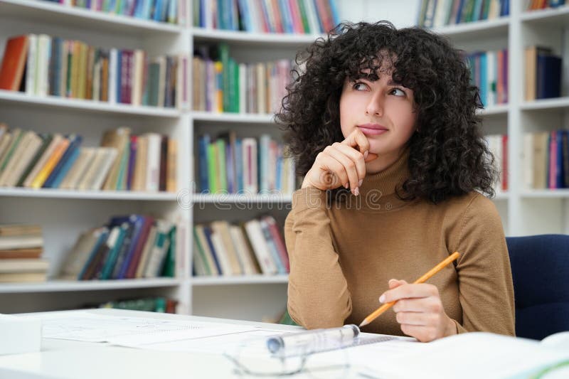 Pretty Woman Working on the Project in the Library Stock Image - Image ...