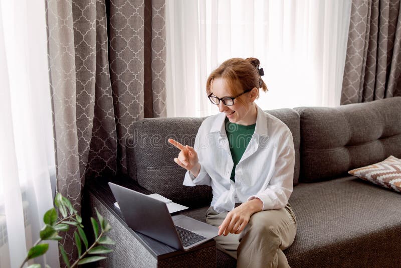 Pretty Womanusing Laptop Elearning or Remote Working at Home Office ...