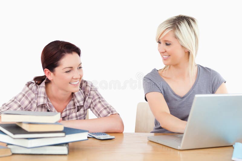 Pretty Women Learning with Laptop and Books Stock Image - Image of ...