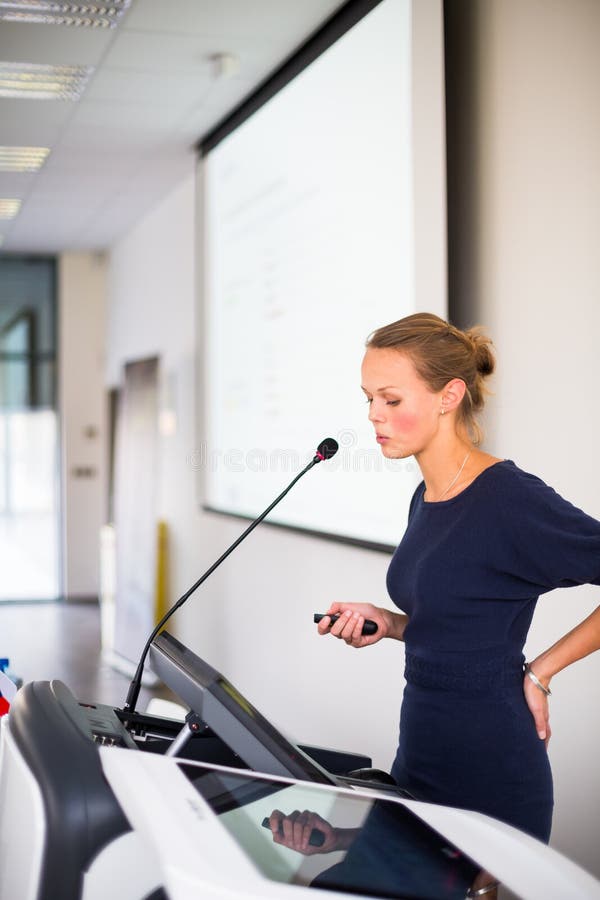 Pretty, Young Business Woman Giving a Presentation Stock Photo - Image ...