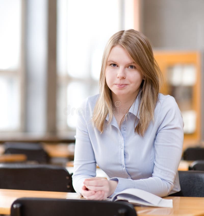 Pretty Young College Student in a Library Stock Image - Image of paper ...