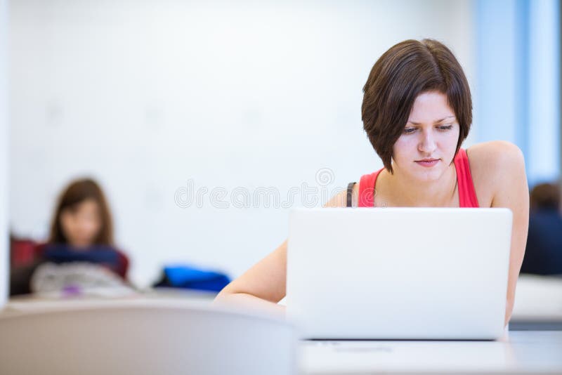 Pretty, Young College Student Studying in the Library Stock Photo ...