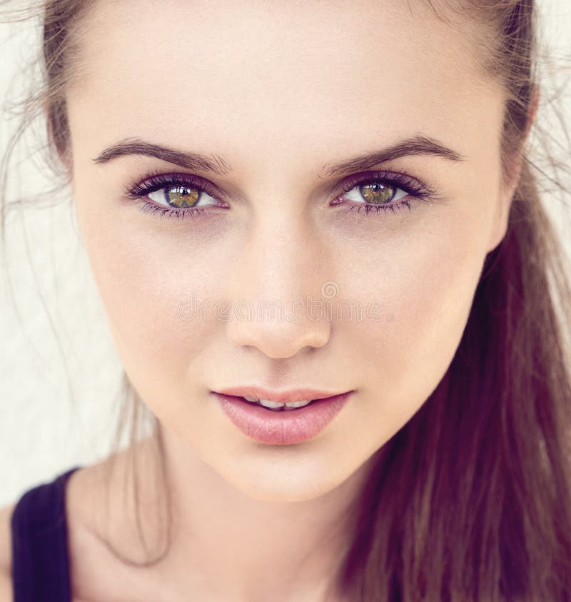 Pretty young female face stock image. Image of attractive - 75960533