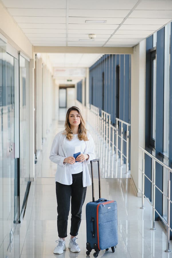 Pretty Young Female Passenger at the Airport Stock Image - Image of ...