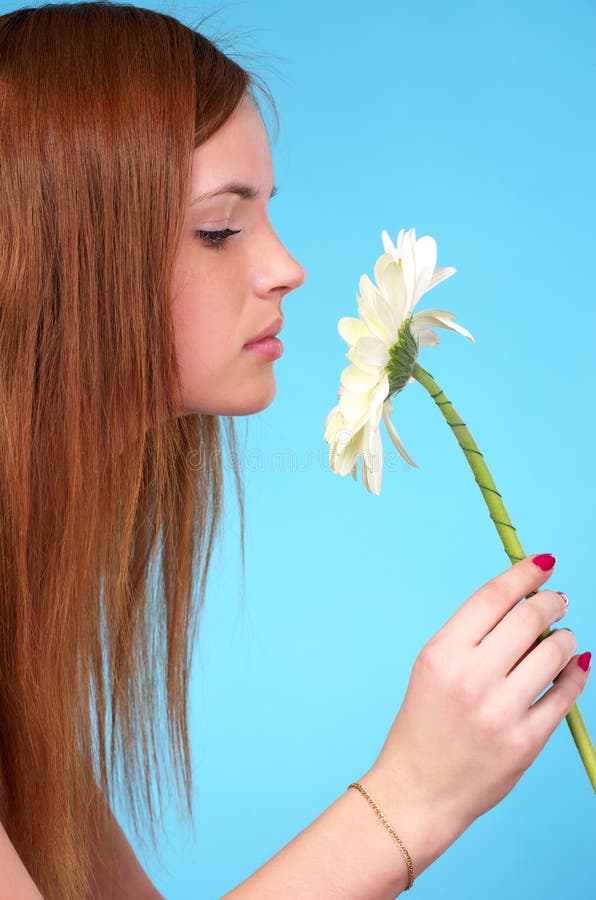 Pretty Young Female Sniffing White Flower Stock Photo - Image of ...