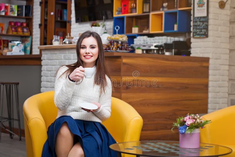 Pretty Young Girl Alone in the Cafe Stock Image - Image of armchairs ...