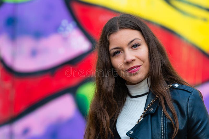Pretty Young Girl Portrait on Blurred Wall Sprayed with Graffiti Stock ...