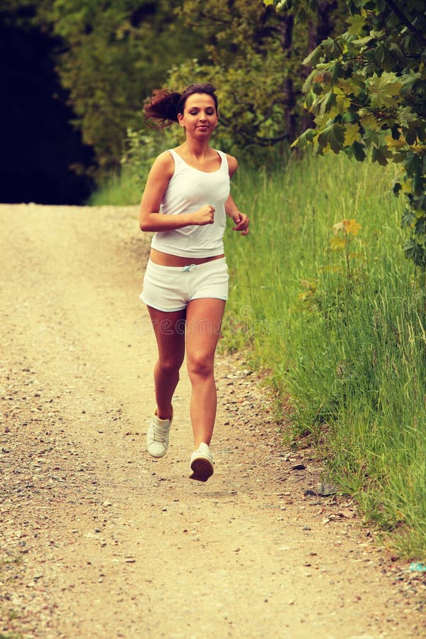 Pretty young girl runner. stock image. Image of recreation - 40942899