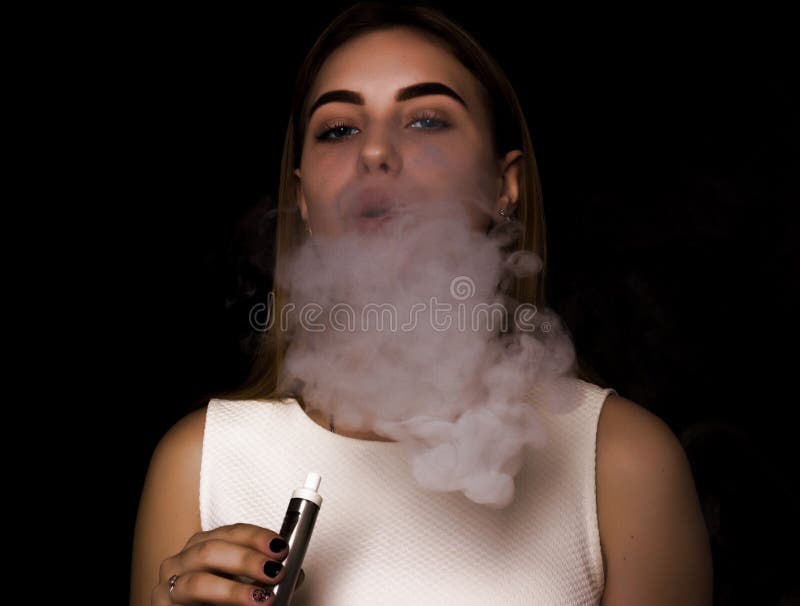 Pretty Young Girl Uses Electronic Cigarette Stock Image - Image of hair ...