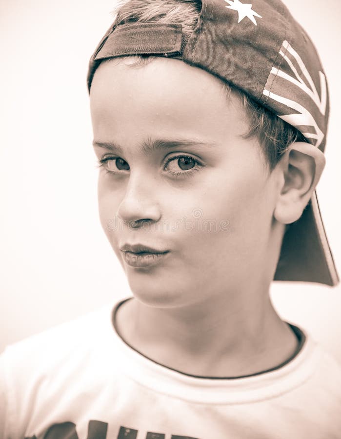 Pretty Young Kid with Backwards Cap on Stock Image - Image of head ...