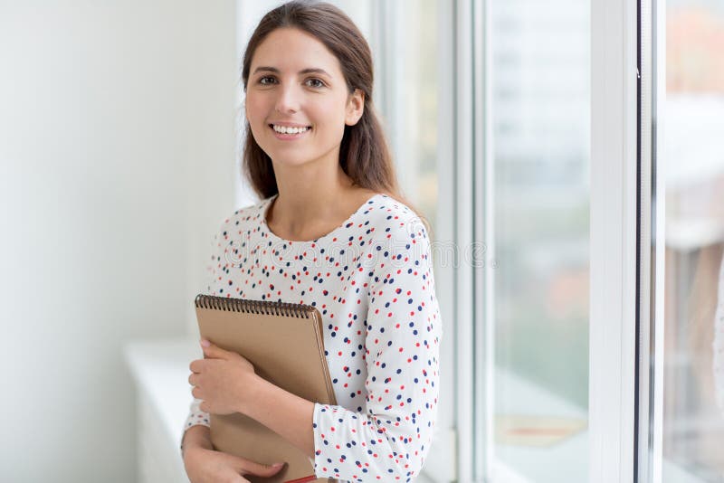 Girl with notepad stock photo. Image of profession, smiling - 105566962