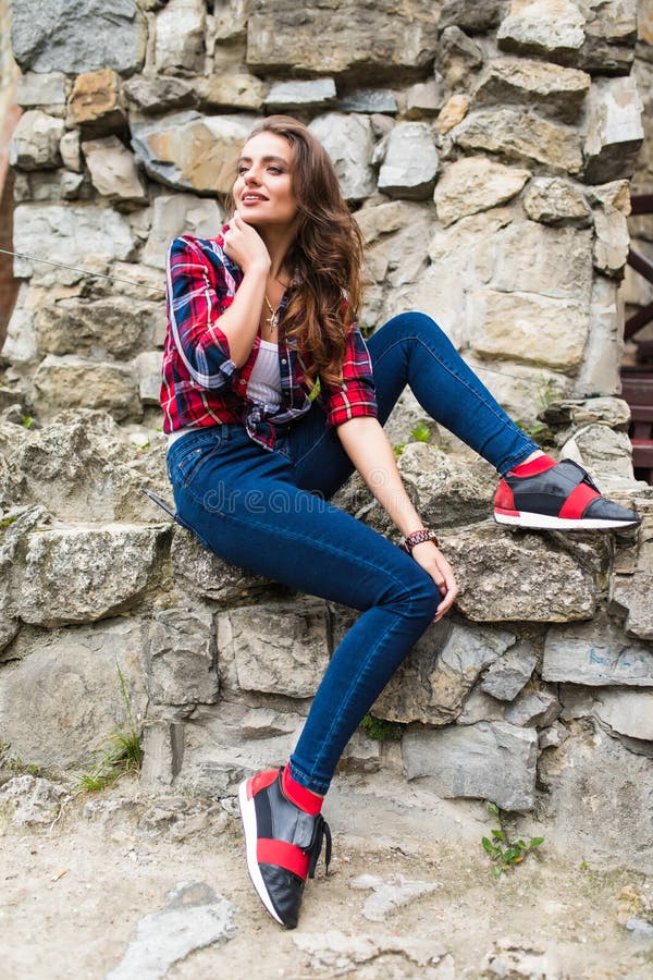 Pretty Young Slim Woman Posing Against Stone Wall Stock Photo - Image ...