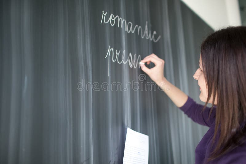 Pretty Young Student Writing on the Blackboard Stock Image - Image of ...