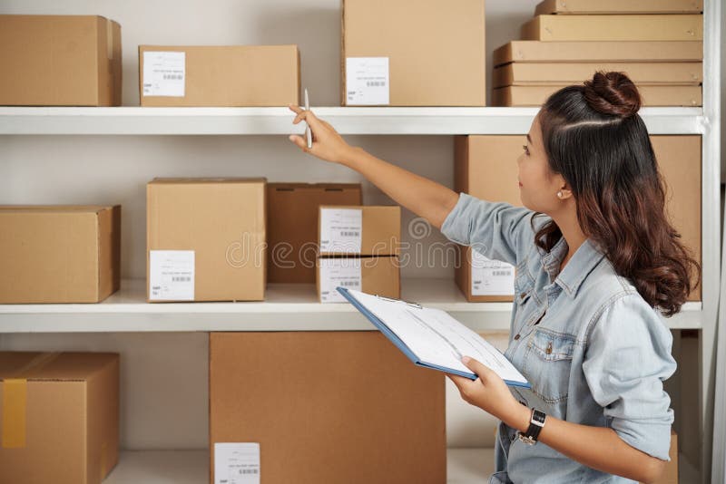 Checking Parcels on Shelves Stock Photo - Image of office ...