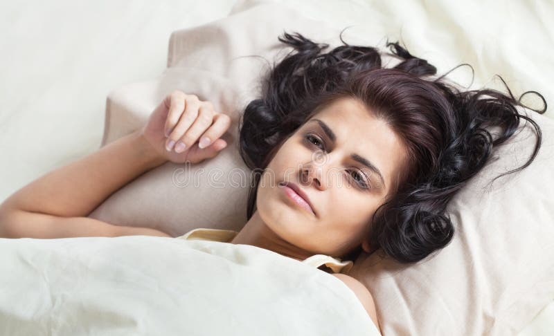 Pretty young woman in bed stock photo. Image of horizontal - 19068574