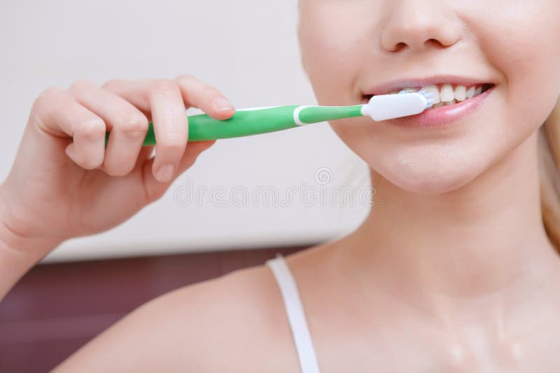 Pretty Young Woman Cleaning Her Teeth Stock Image - Image of apartment ...