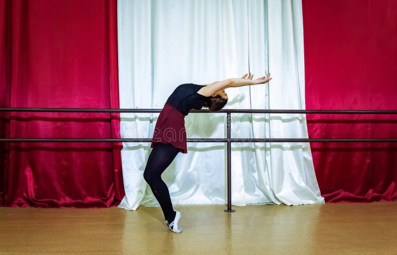 Pretty Young Woman in Dancing Studio, Woman Exercising in Dance Studio ...