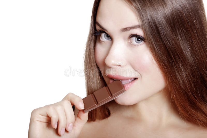 Woman eating chocolate stock photo. Image of pretty, food - 55112586