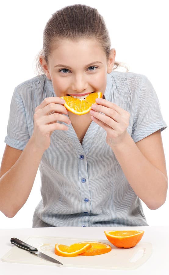 Portrait of a Young Woman Eating an Orange Stock Photo - Image of ...