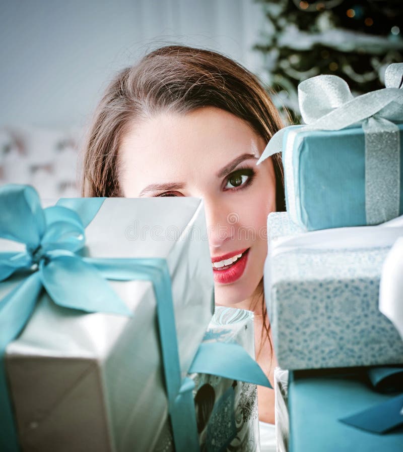 Pretty Woman Holding a Bunch of Gift Boxes Stock Photo - Image of ...