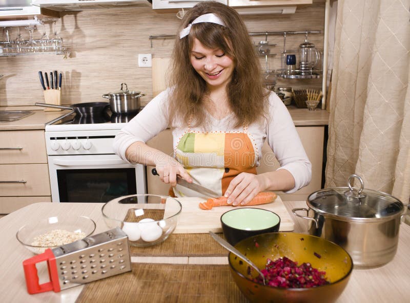 Pretty Young Woman on Kitchen Preparing Dinner Stock Image - Image of ...