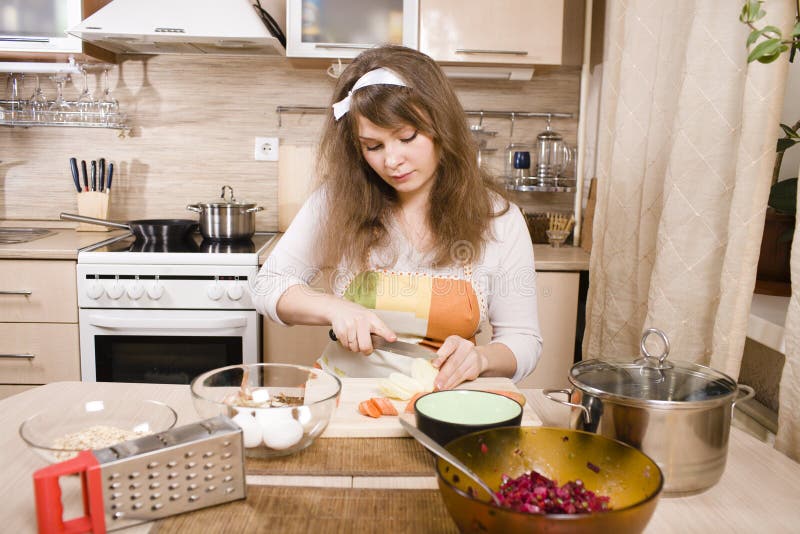 Pretty Young Woman on Kitchen Preparing Dinner Stock Photo - Image of ...
