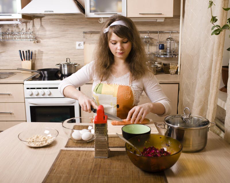 Pretty Young Woman on Kitchen Preparing Dinner Stock Photo - Image of ...