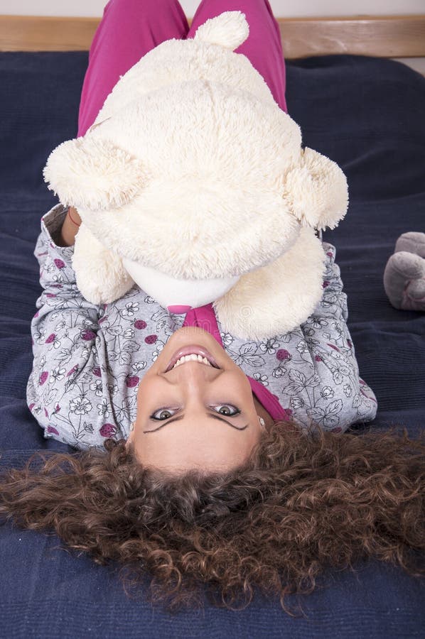 Pretty Young Woman Lieing On The Bed Stock Photo - Image of happy ...