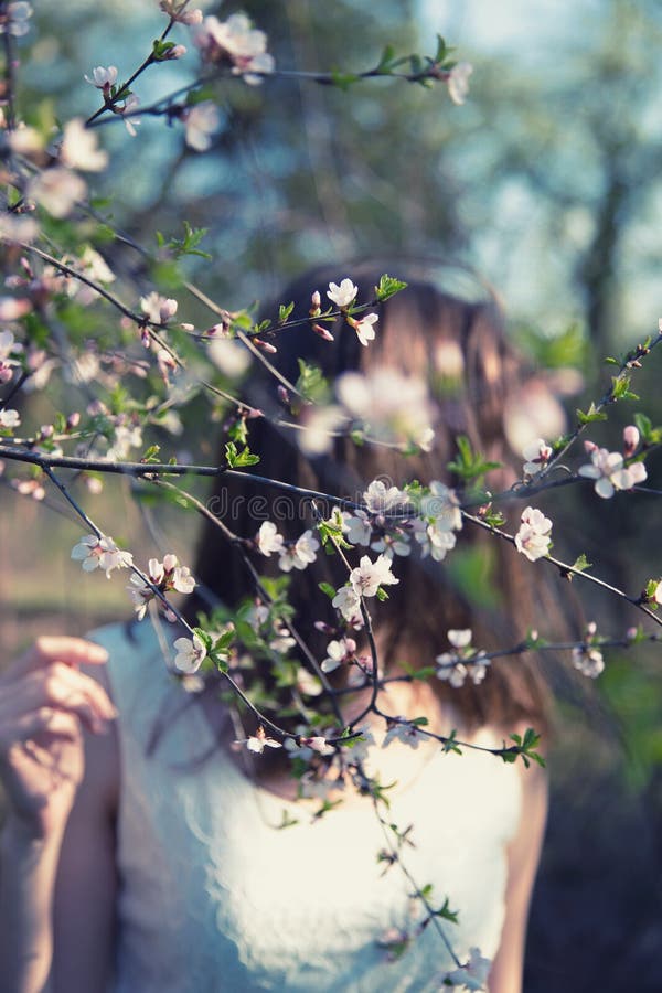 Pretty Young Woman Near Tree with Flowers Stock Image - Image of girl ...