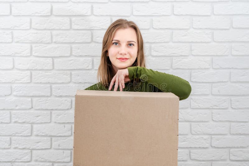 Pretty Young Woman with Parcel Box. Delivering a Parcel Stock Image ...