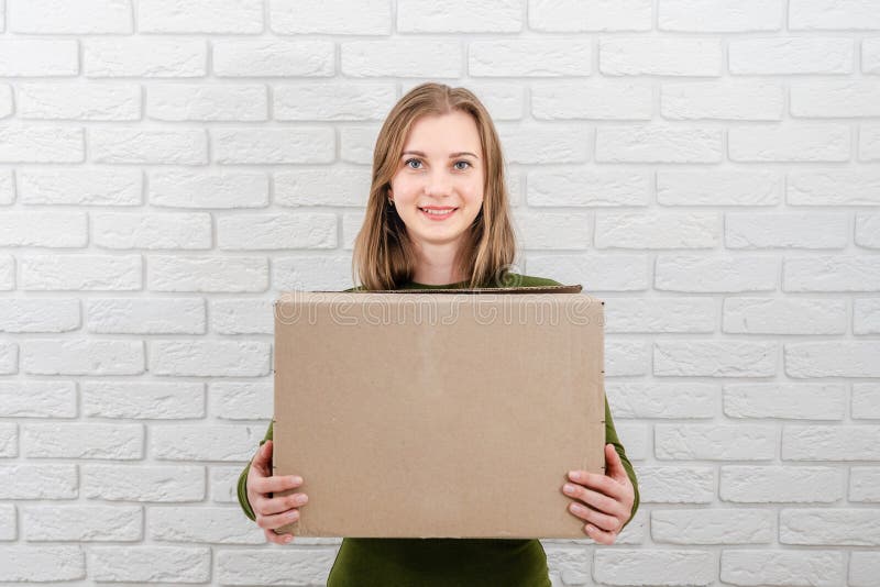 Pretty Young Woman with Parcel Box. Delivering a Parcel Stock Image ...
