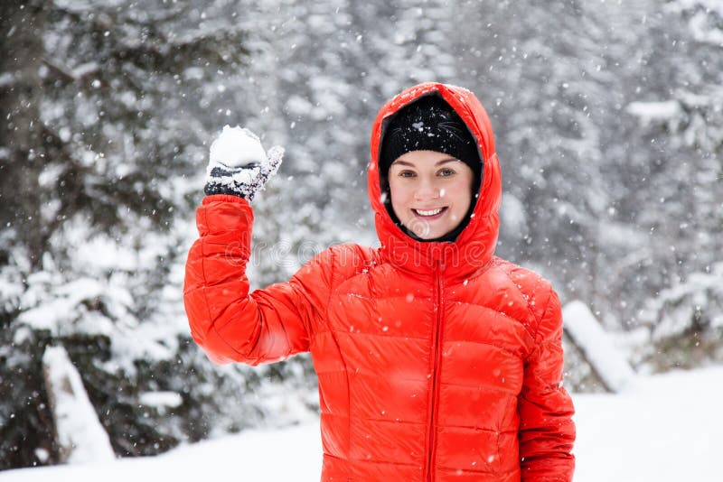 Pretty Young Woman Playing Snowballs Stock Image - Image of joyful ...