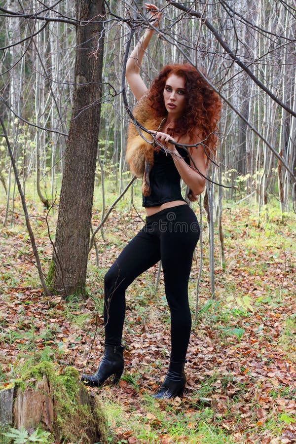 Pretty Young Woman Poses with Tree Branches Stock Photo - Image of girl ...