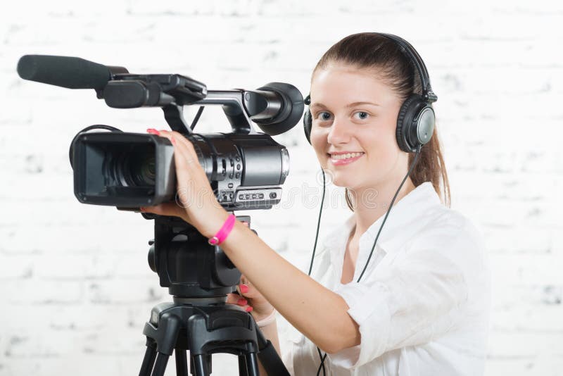 A Pretty Young Woman with a Professional Camera Stock Image - Image of ...