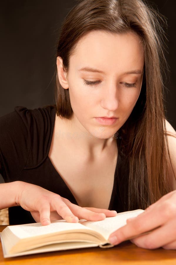Pretty Young Woman Reading a Book Stock Photo - Image of twenties ...