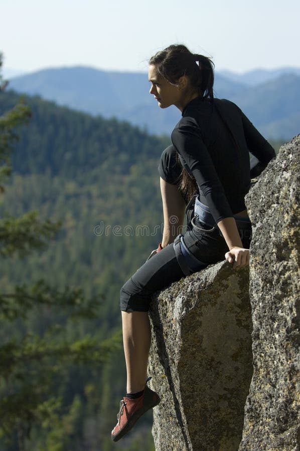 Pretty Young Woman on Cliff Stock Image - Image of climbing, activity ...