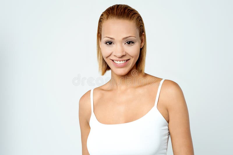 Pretty Young Woman Smiling Warmly Stock Image - Image of lovely, female ...