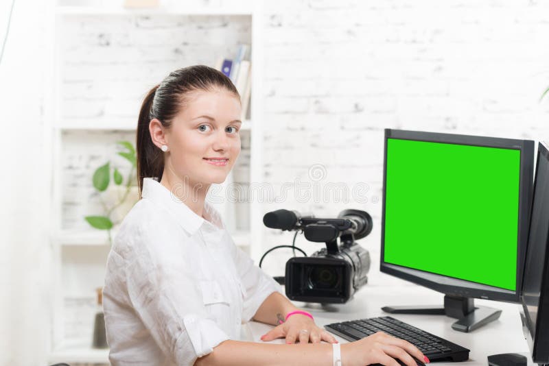 Woman Video Editor and Young Assistant Using Graphic Tablet Stock Photo ...