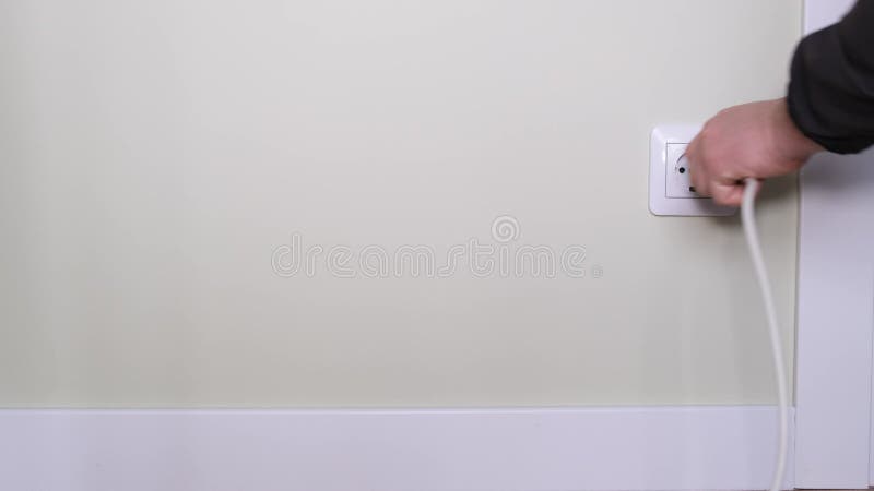 Turning Off Electrical Appliances from the Electrical Outlet in the ...