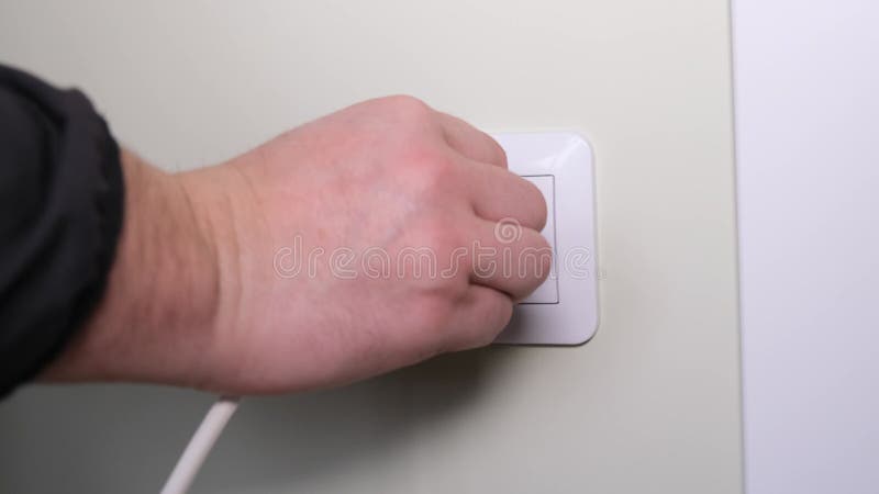 Turning Off Electrical Appliances from the Electrical Outlet in the ...