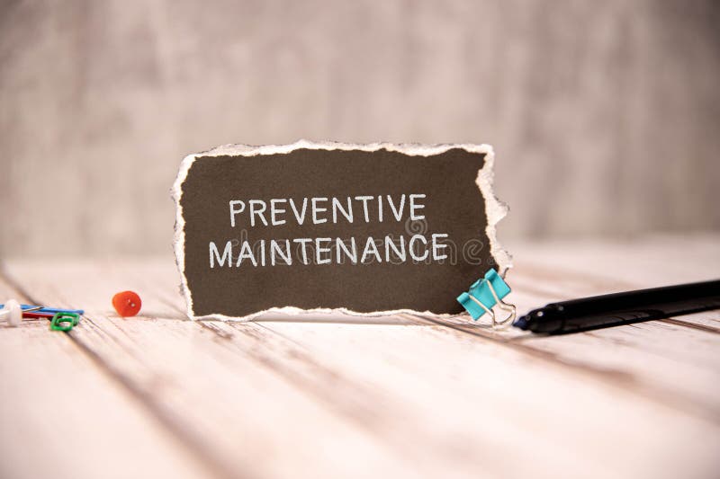 Preventive Maintenance Text Written on a Notebook with Pencils Stock ...