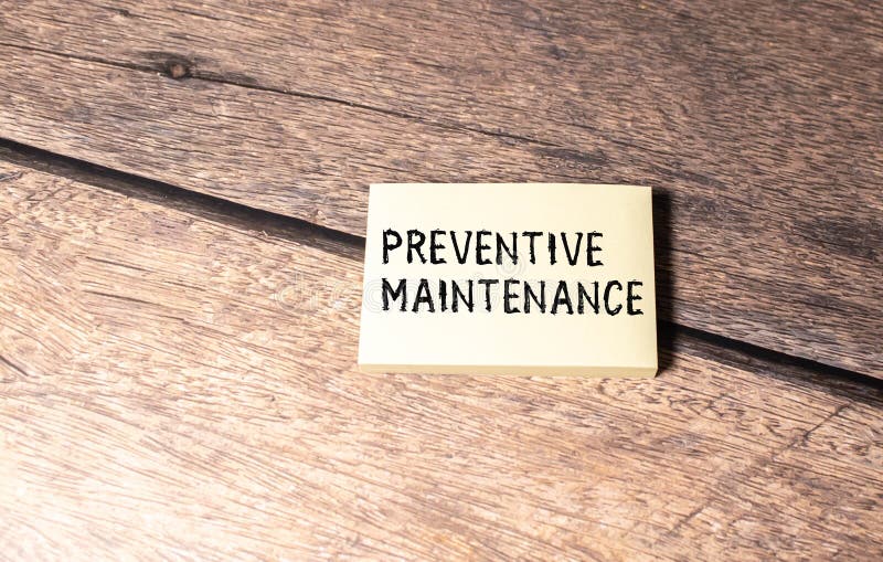 Preventive Maintenance Text Written on a Notebook with Pencils Stock ...