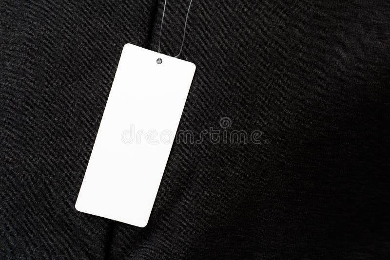 Price Tag on Black Fabric Texture Stock Image - Image of gray, closeup ...