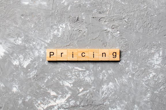 Pricing Word Written on Wood Block. Pricing Text on Table, Concept ...