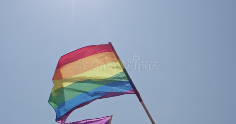 Pride LGBT Rainbow Flag Waving in Slow Motion during a Pride Parade ...
