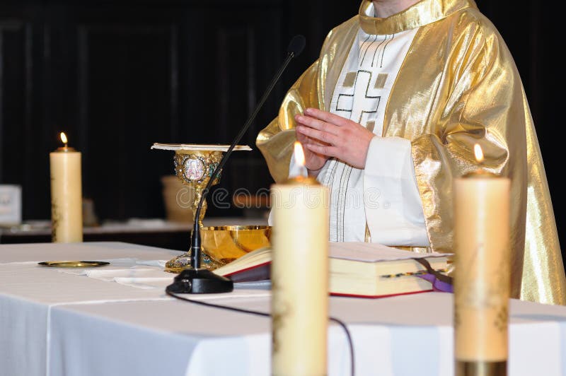 Catholic Priest with Chalice and Host at Communion Stock Image - Image ...