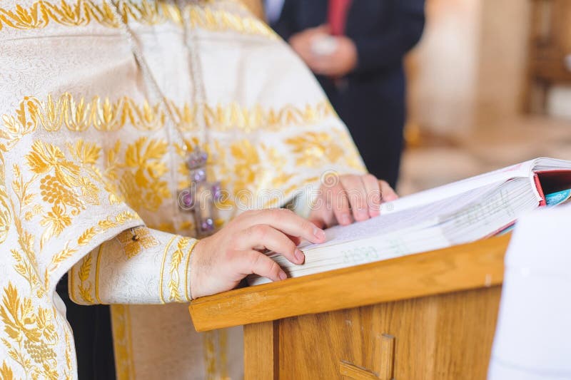 Priest with Bible stock photo. Image of dress, clothing - 63444624