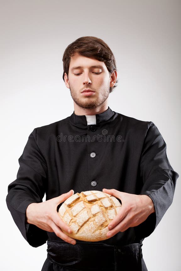 Priest with bread stock image. Image of clerical, catholicism - 38596077