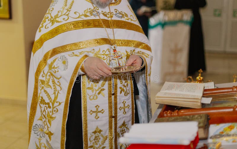 The Priest Carries Wedding Rings on a Golden Plate Stock Image - Image ...